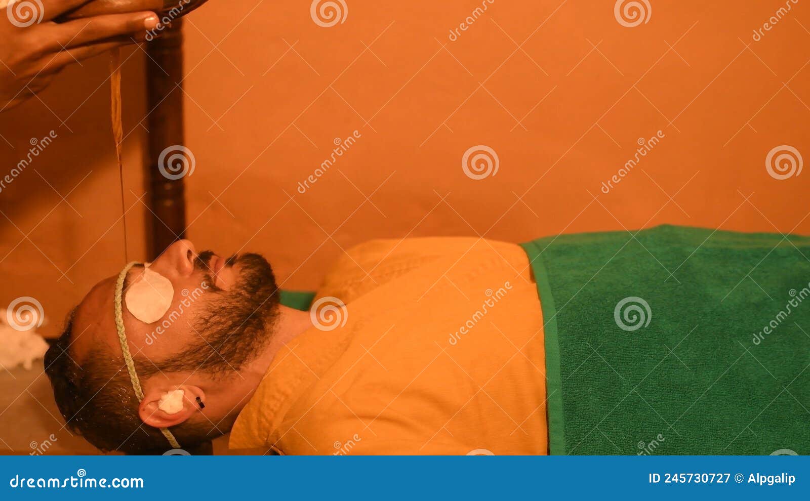 Man Having Ayurveda Healing Therapy For Head Relaxation Massage Stock