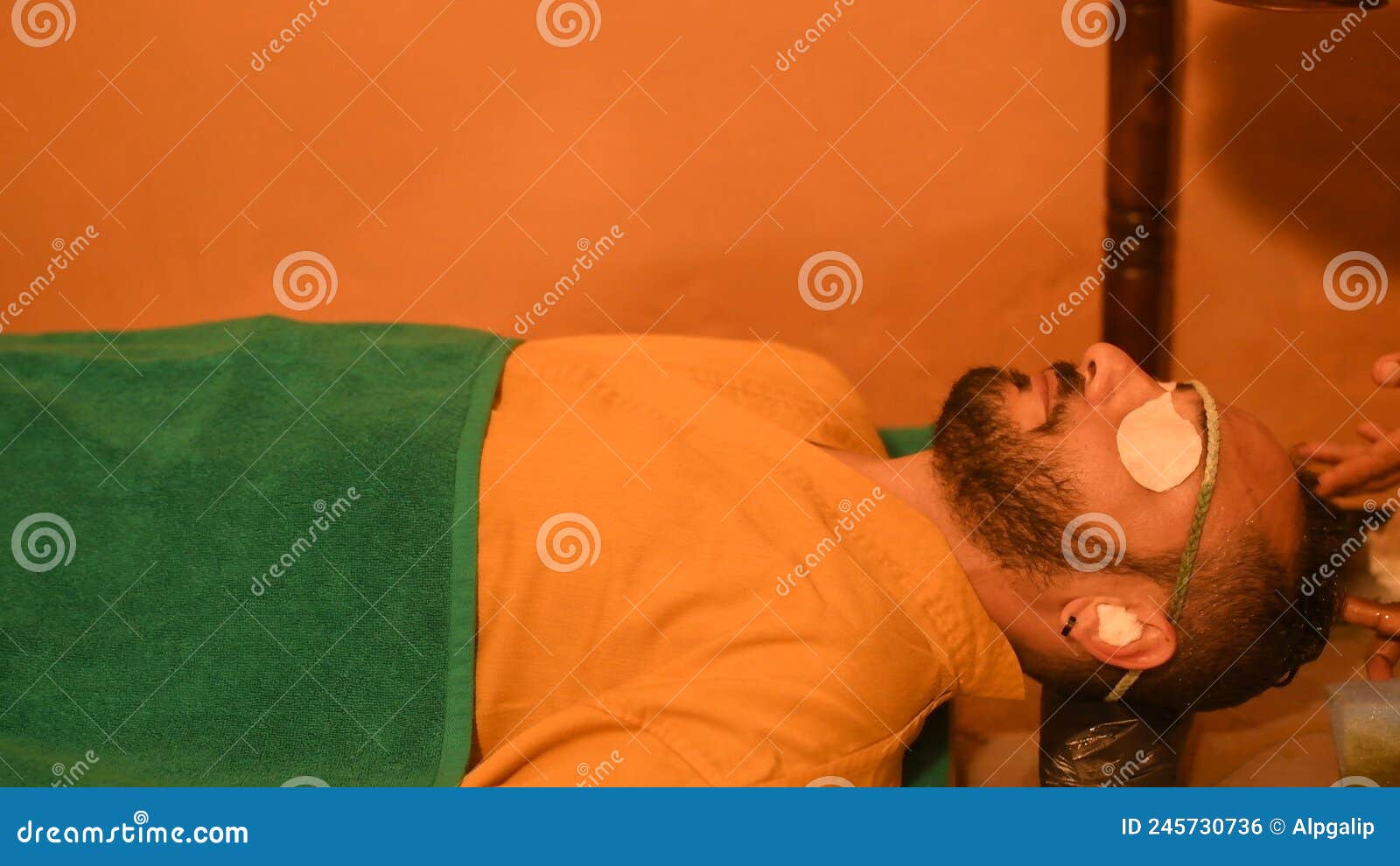Man Having Ayurveda Healing Therapy For Head Relaxation Massage Stock