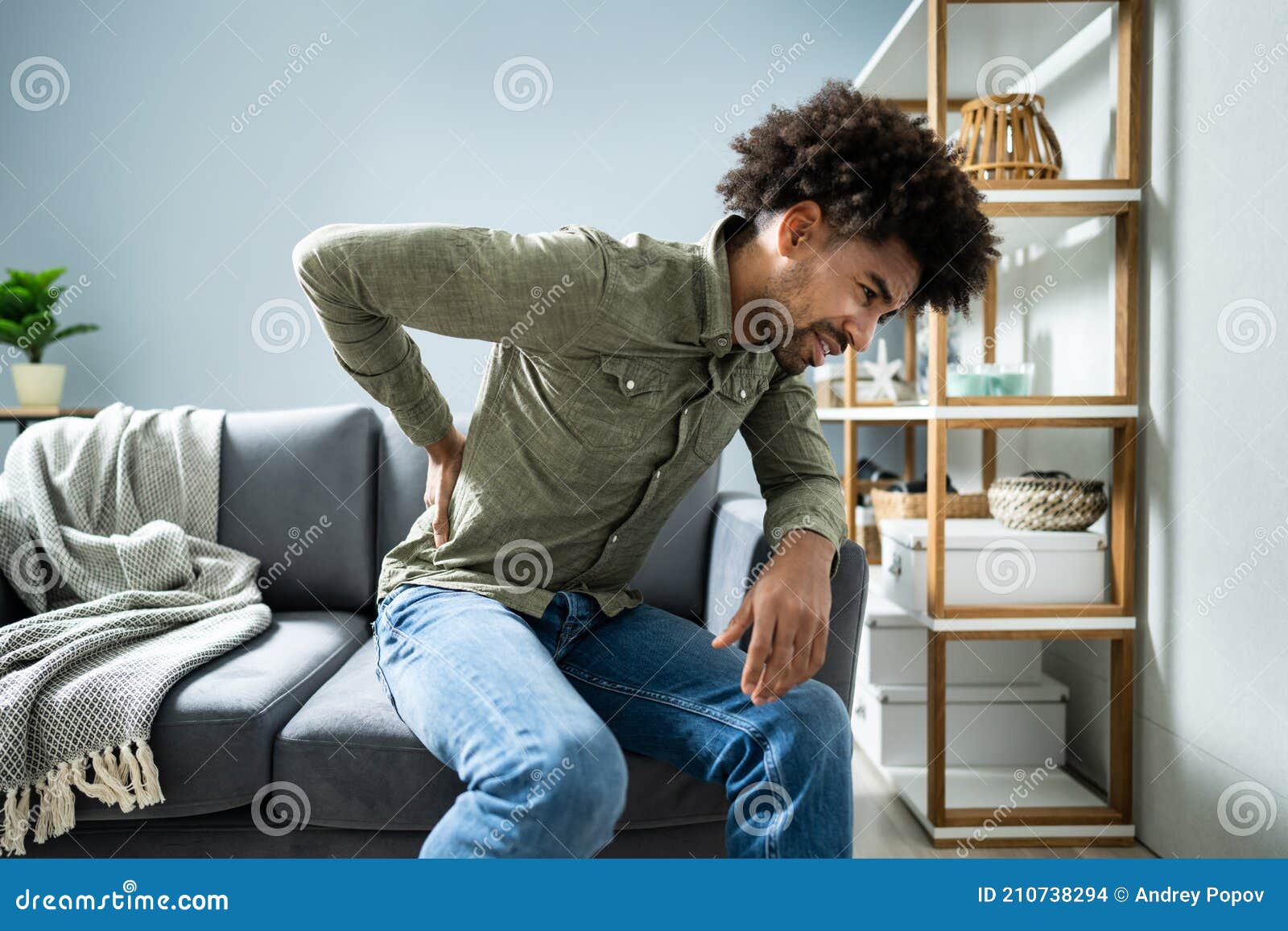 Man Having Backache while Sitting Stock Photo - Image of sickness, home ...