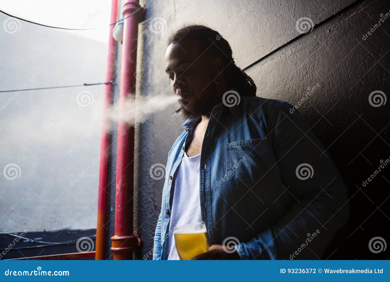 Man Having Beer while Smoking Stock Photo - Image of blowing ...