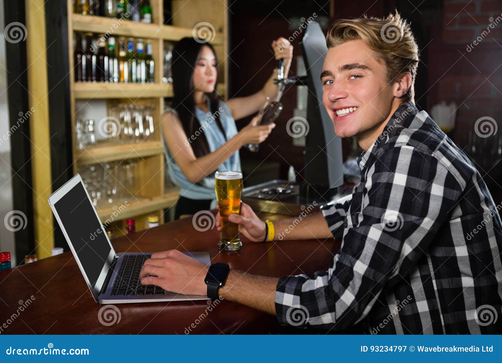 Man Having Beer while Using Laptop at Bar Counter Stock Image - Image ...