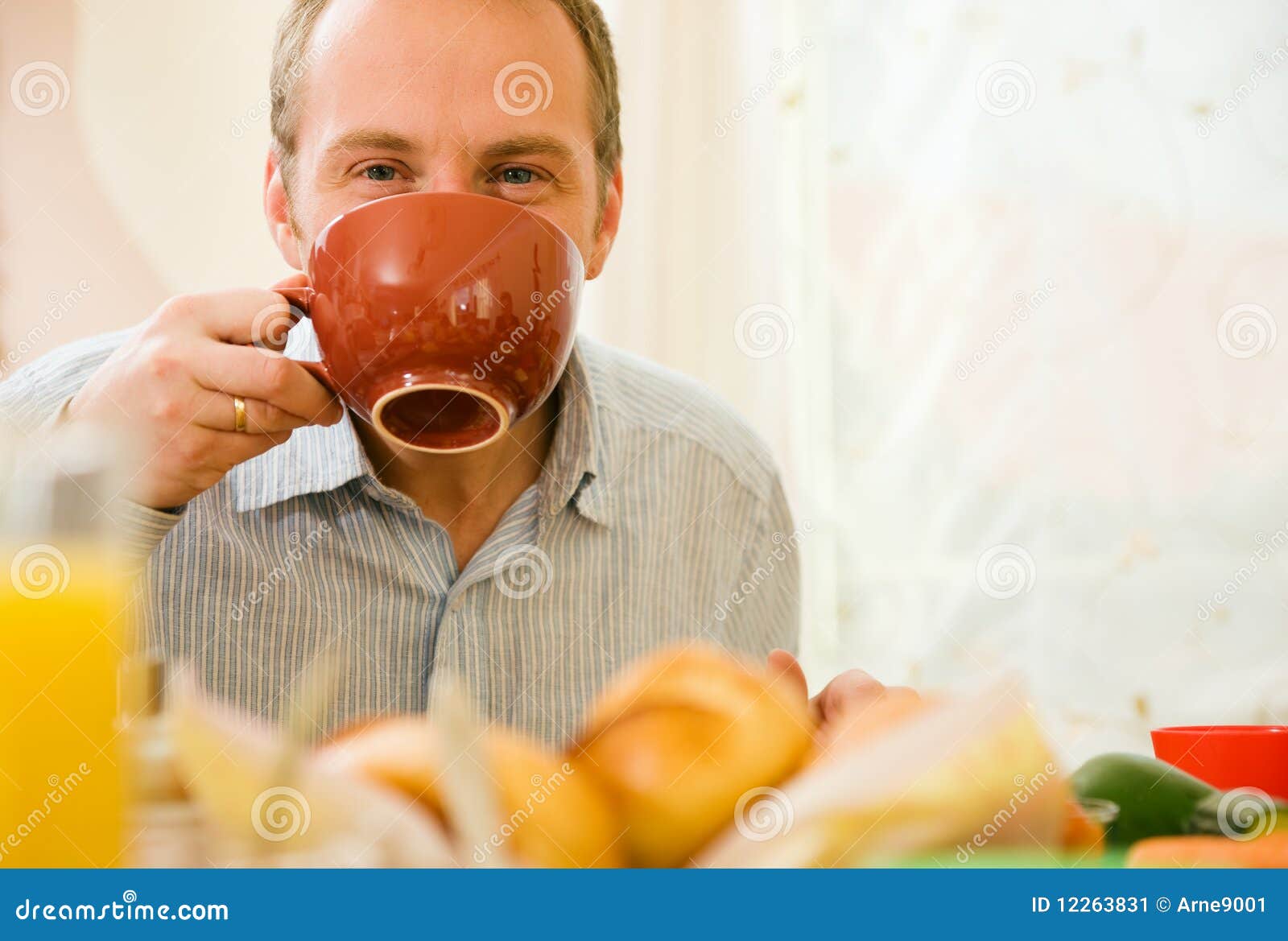 Man having breakfast stock image. Image of morning, eating - 12263831