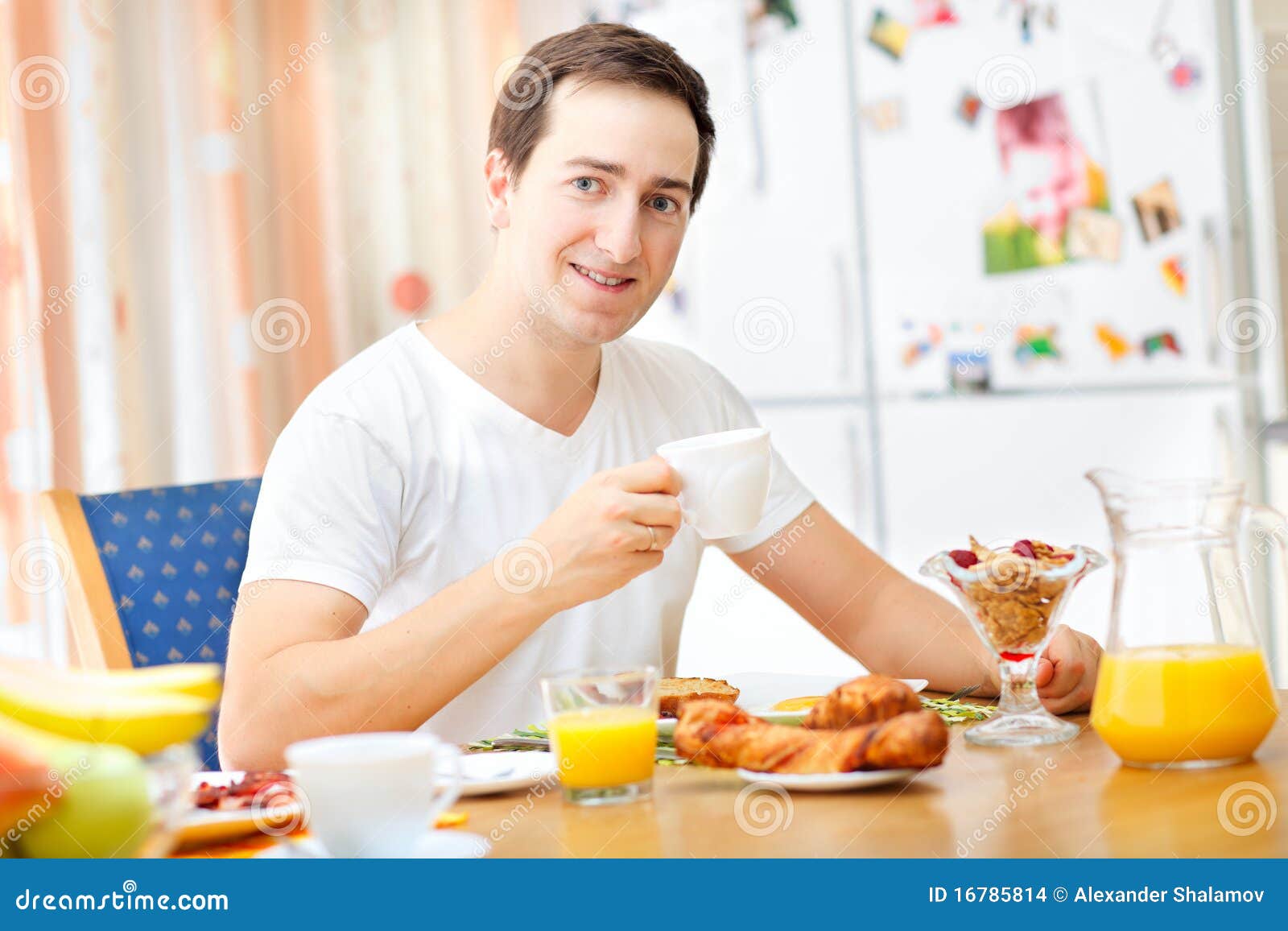Man having breakfast stock photo. Image of flake, looking - 16785814