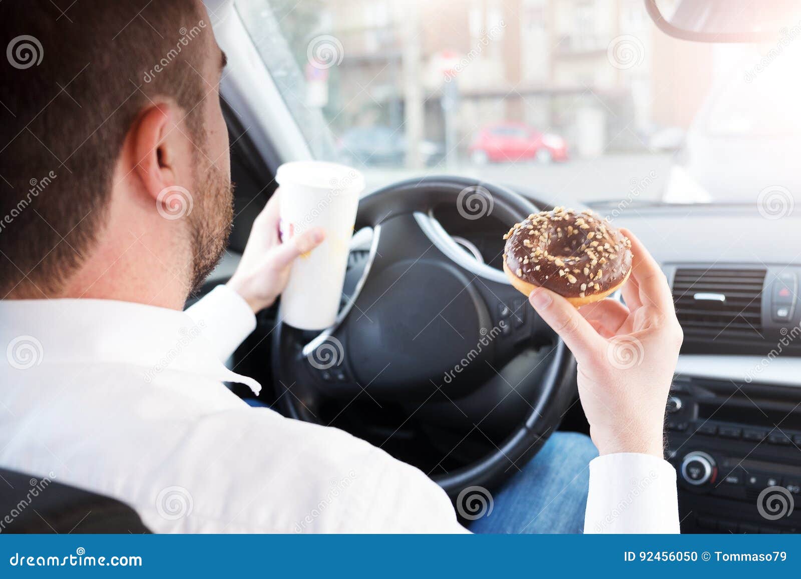 Man Having Breakfast and Driving Seated in Car Stock Photo - Image of ...