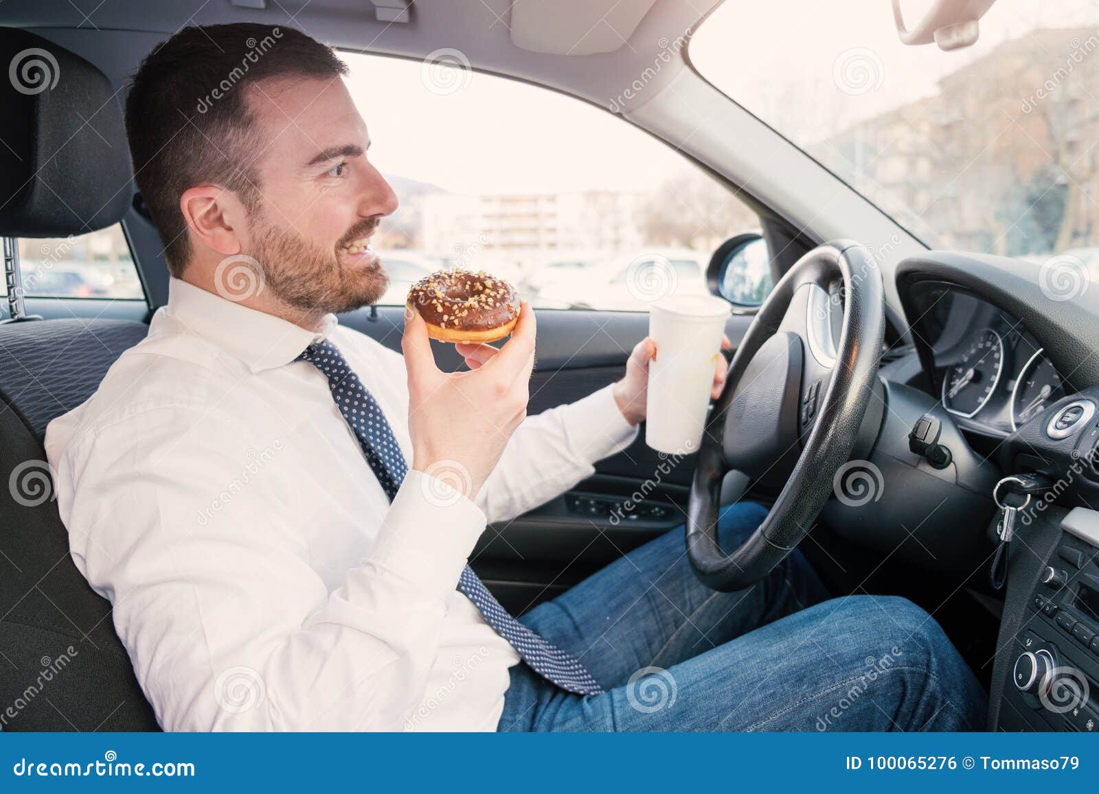 Man Having Breakfast and Driving Seated in Car Stock Photo - Image of ... Man Having Breakfast and Driving Seated in Car Stock Photo - Image of ...