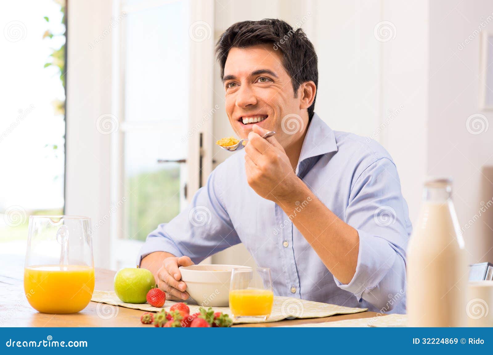 Man Having Breakfast stock image. Image of home, bowl - 32224869