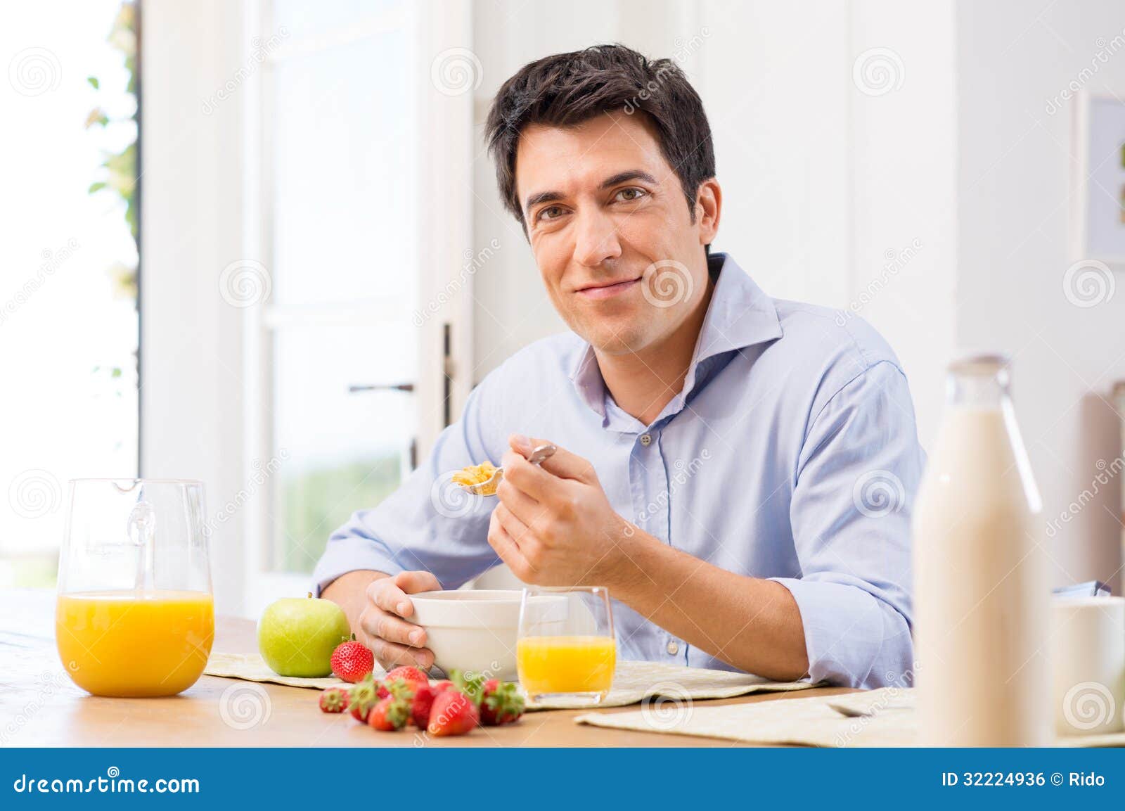 Man Having Breakfast stock photo. Image of dining, looking - 32224936