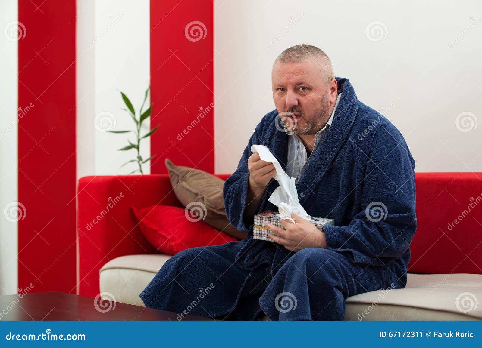 Man Having a Cold Holding Tissue with Box Full of Tissues Stock Image ...