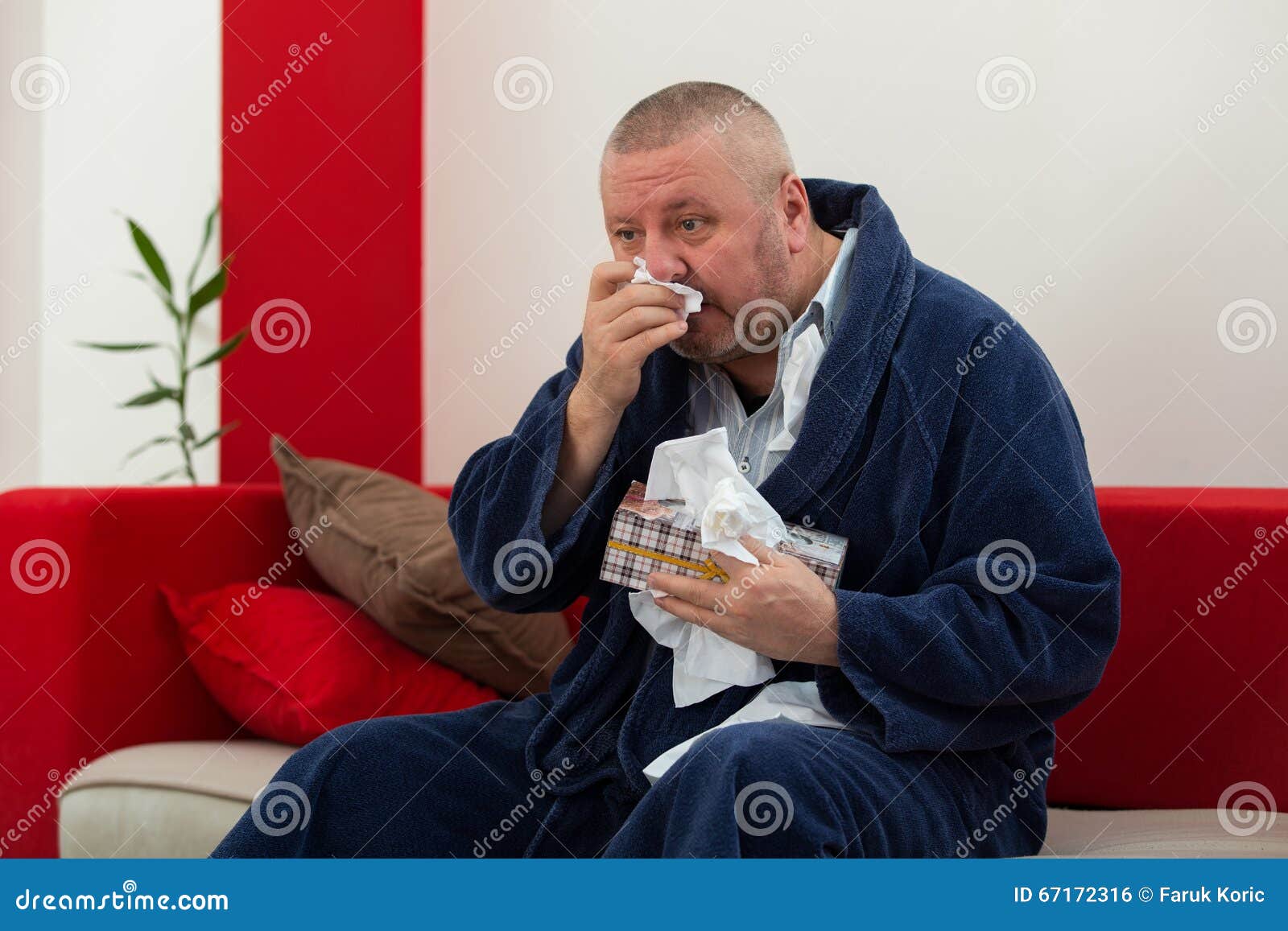 Man Having a Cold Holding Tissue with Box Full of Tissues Stock Photo ...