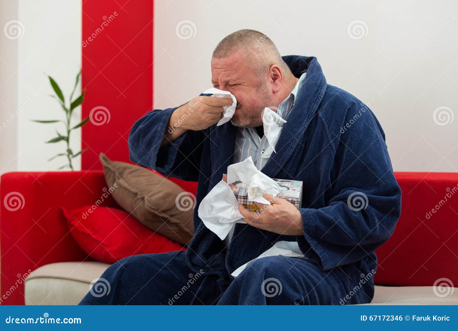 Man Having a Cold Holding Tissue with Box Full of Tissues Stock Photo ...