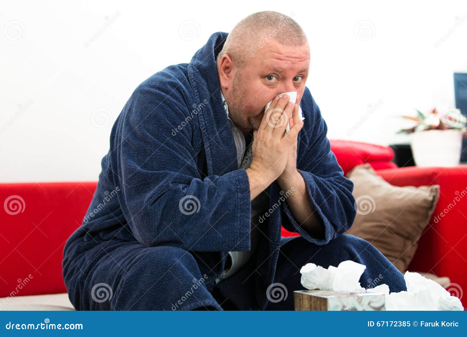 Man Having a Cold Holding Tissue with Box Full of Tissues Stock Image ...
