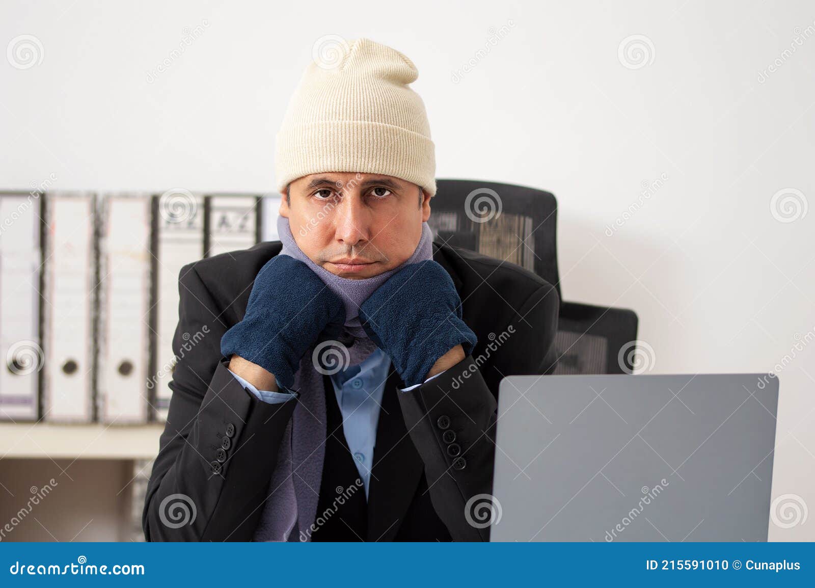 Man having cold looking stock photo. Image of cold, desktop - 215591010