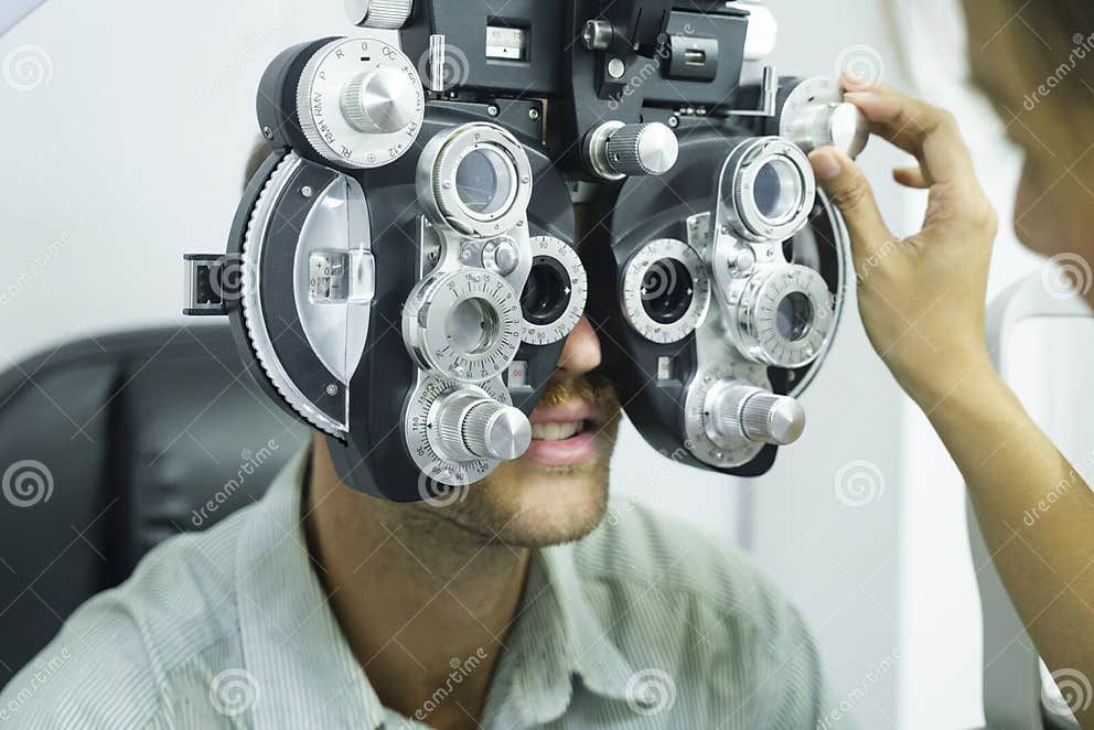 Man Having Eye Test Using Phoropter. Stock Image - Image of medicine ...