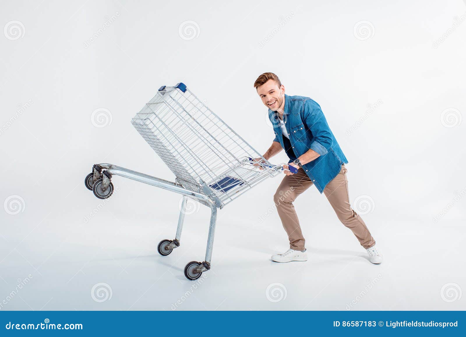 Man Having Fun with Shopping Trolley on White Stock Image - Image of ...