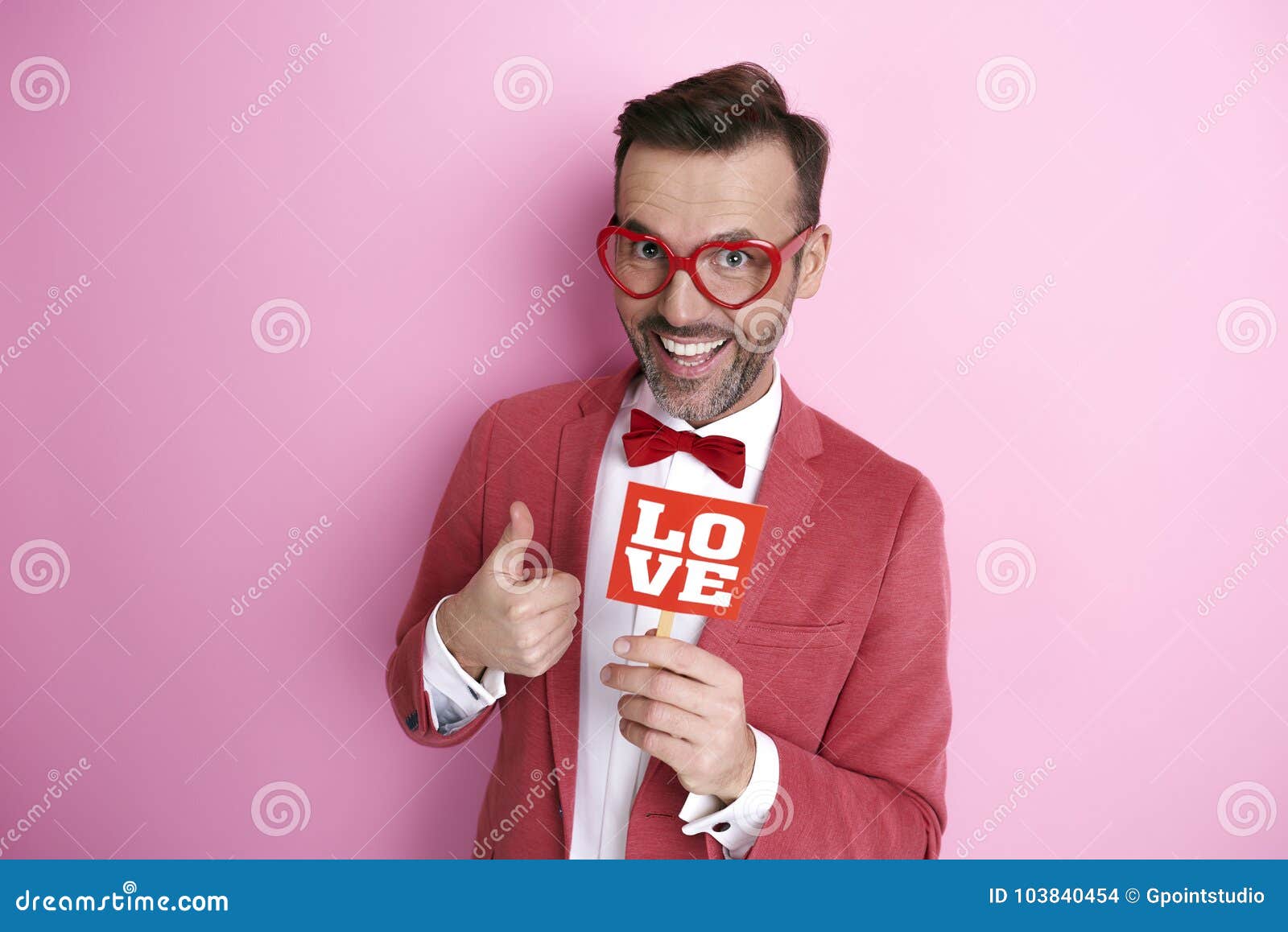 Happy man with love sign stock photo. Image of stubble - 103840454