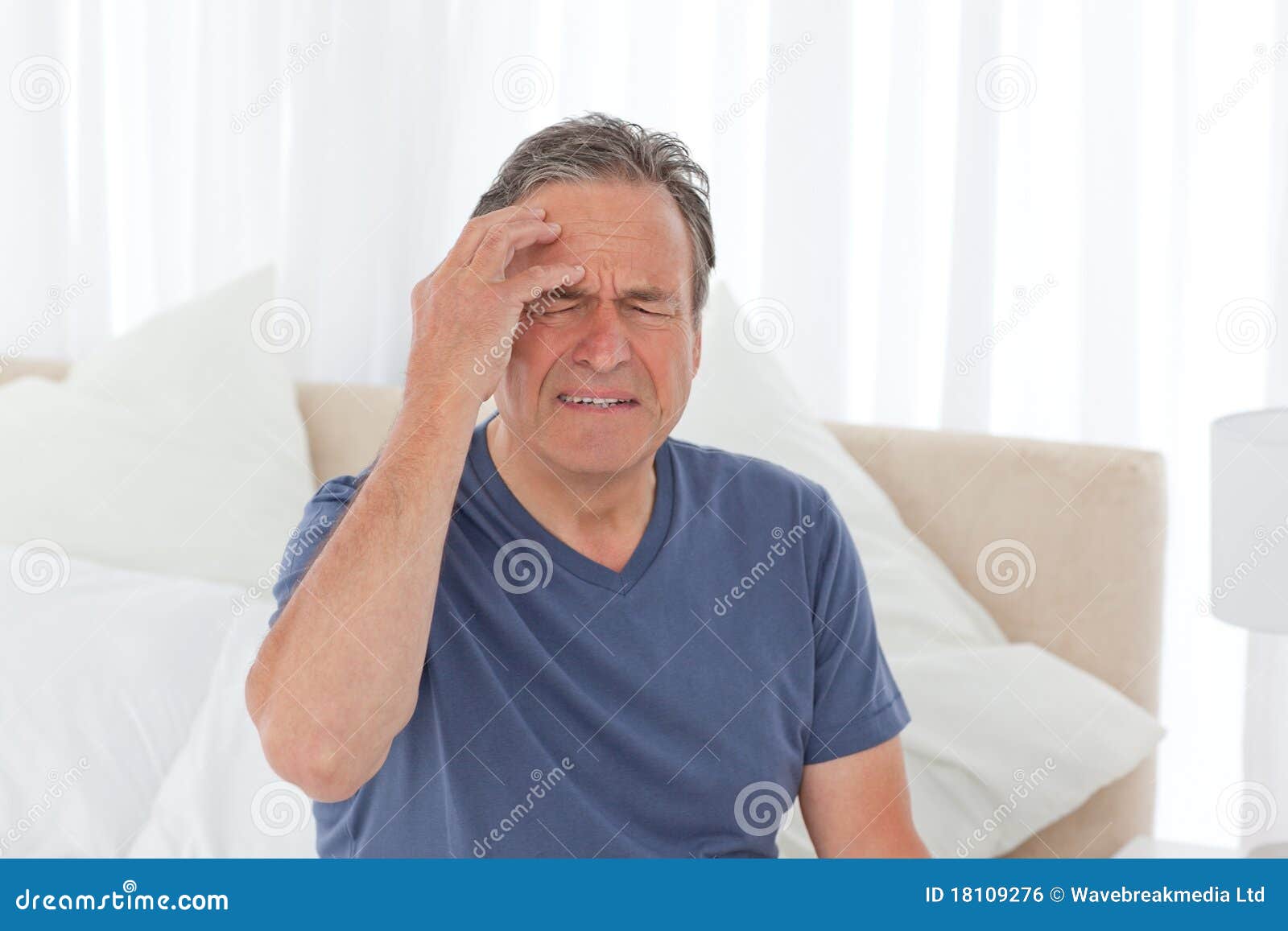 Man having a headache stock photo. Image of sitting, adult - 18109276