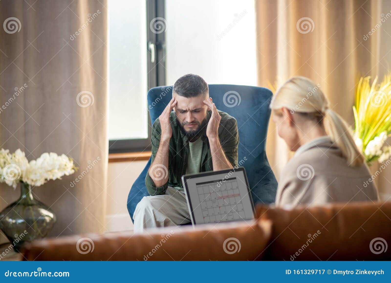 Man Having Headache while Talking To Psychologist Stock Image - Image ...