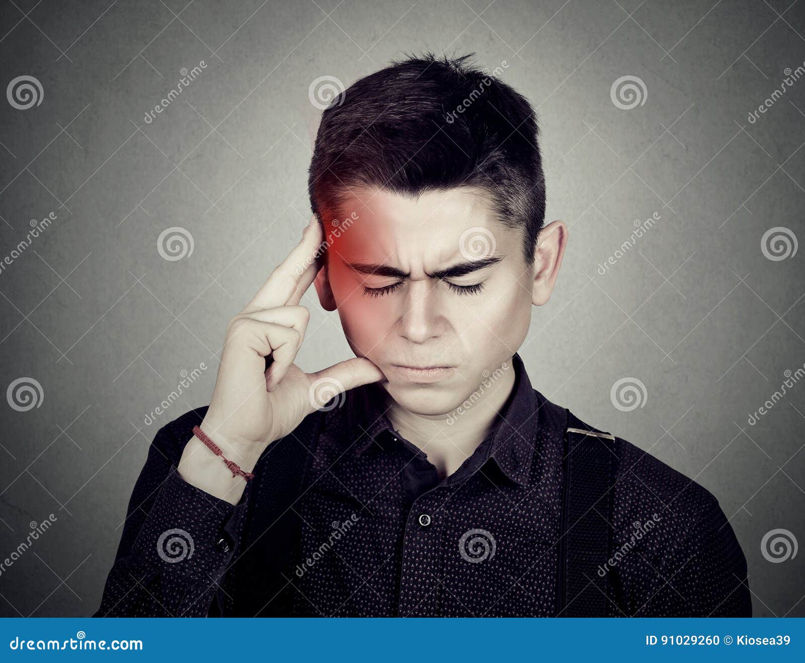 Man Having a Headache Touching with Hand Temple Colored in Red Stock ...