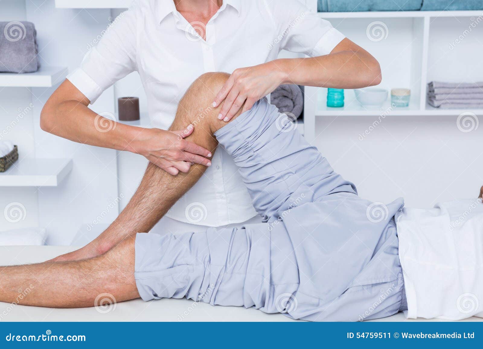 Man having knee massage stock image. Image of room, holding - 54759511