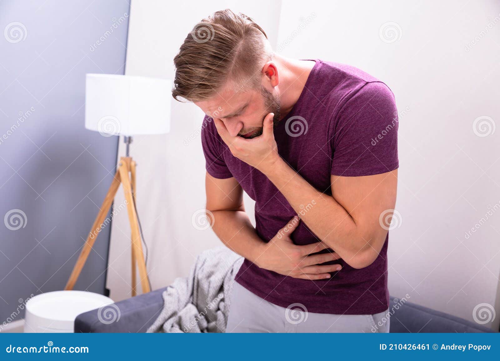 Man Having Nausea Standing at Home Stock Image - Image of home, abdomen ...
