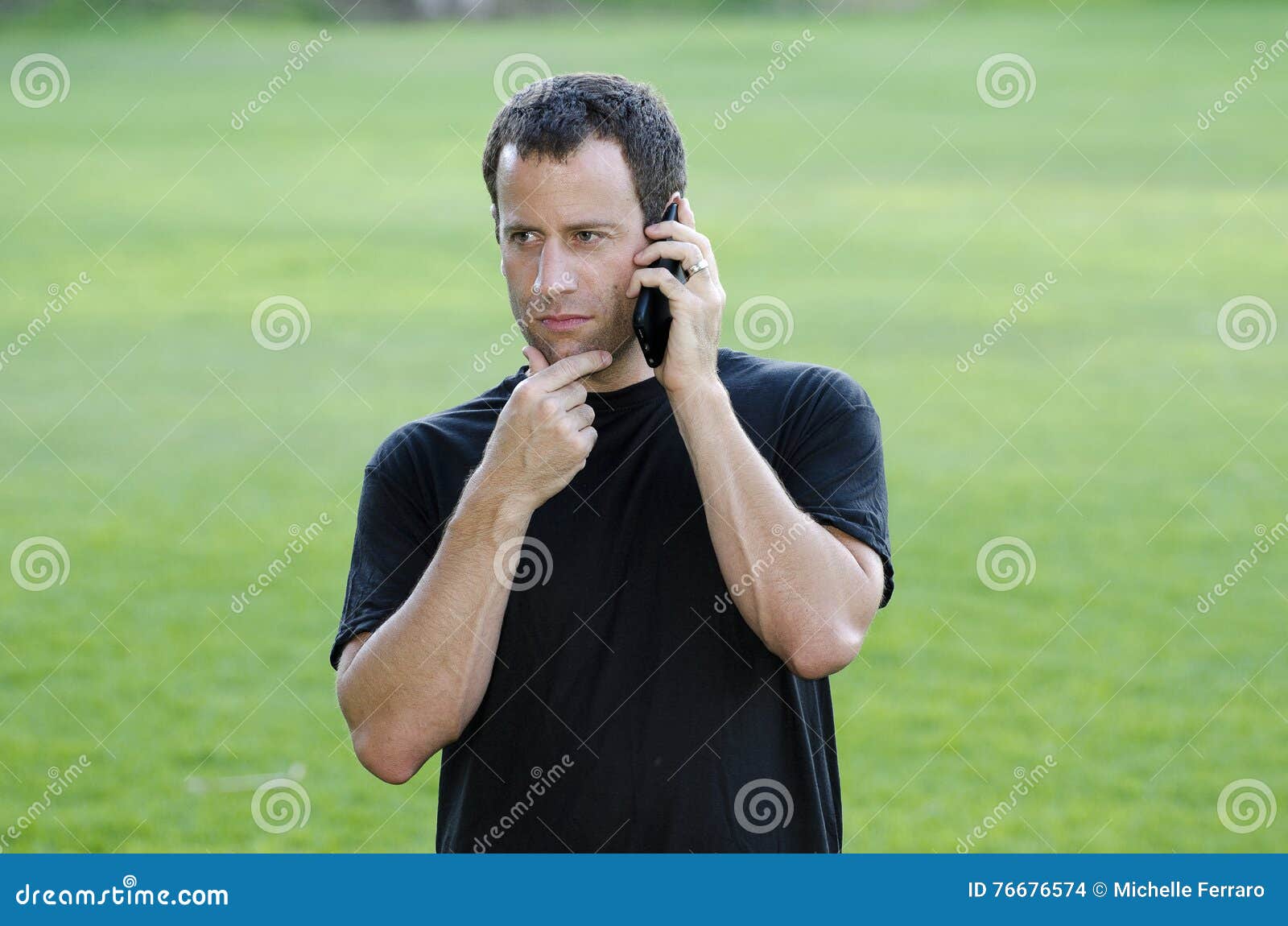 Man Having a Serious Phone Call Stock Photo - Image of green, caucasian ...