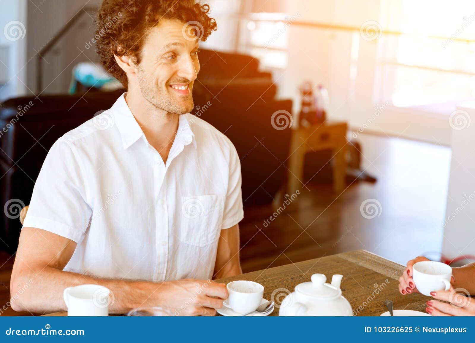 Man having tea at home stock image. Image of kitchen - 103226625