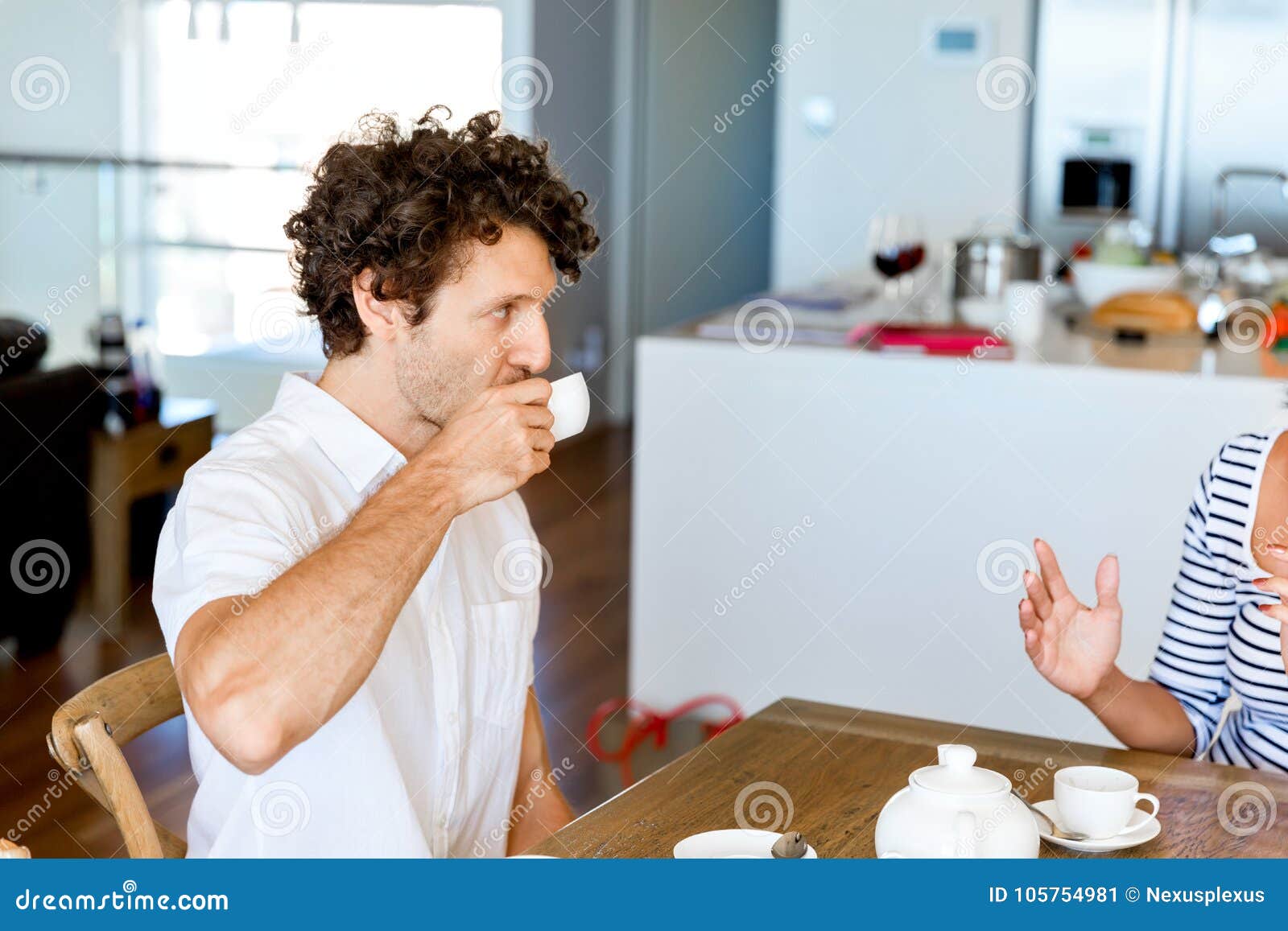 Man having tea at home stock image. Image of confident - 105754981