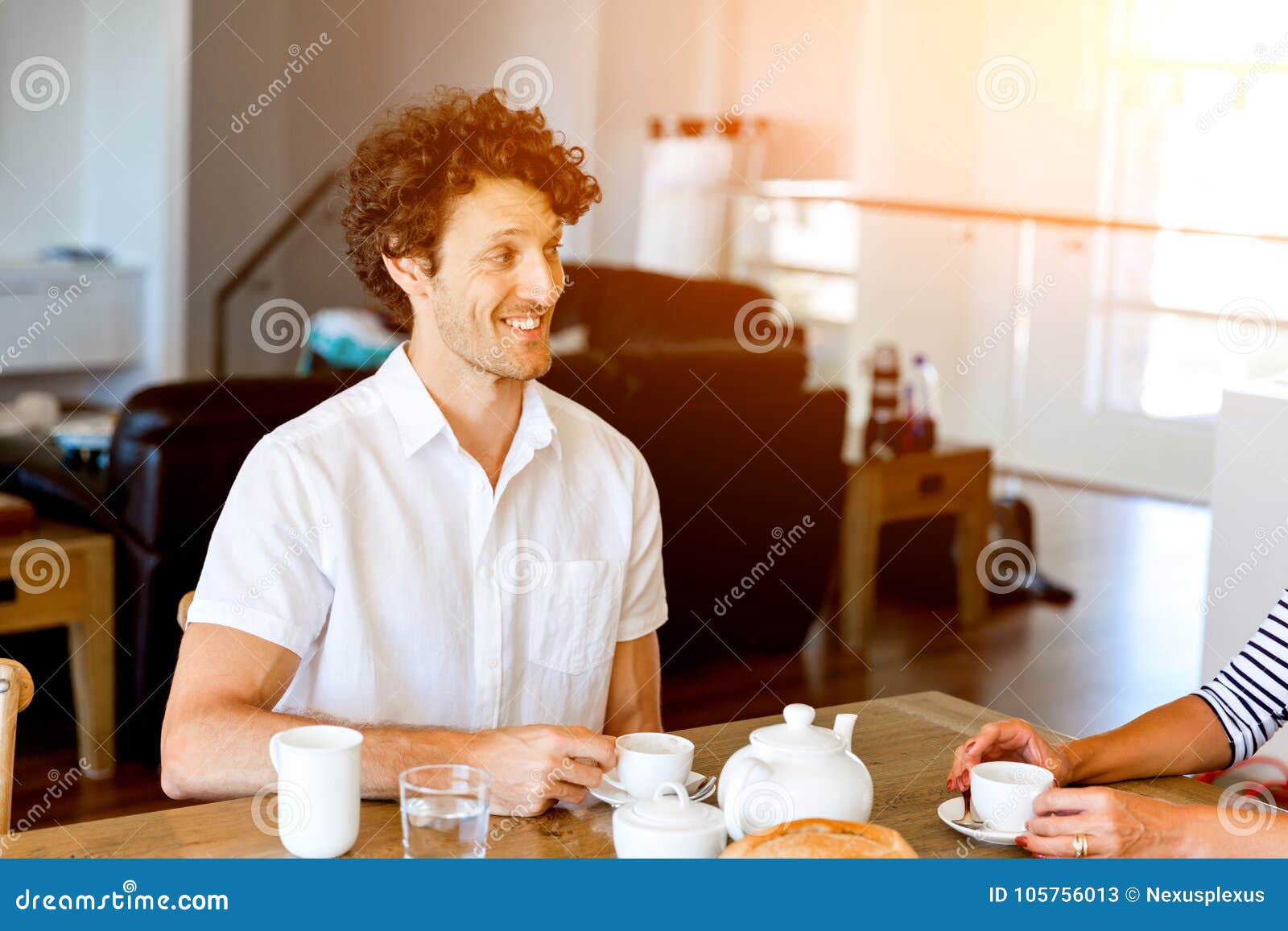 Man having tea at home stock image. Image of relaxed - 105756013