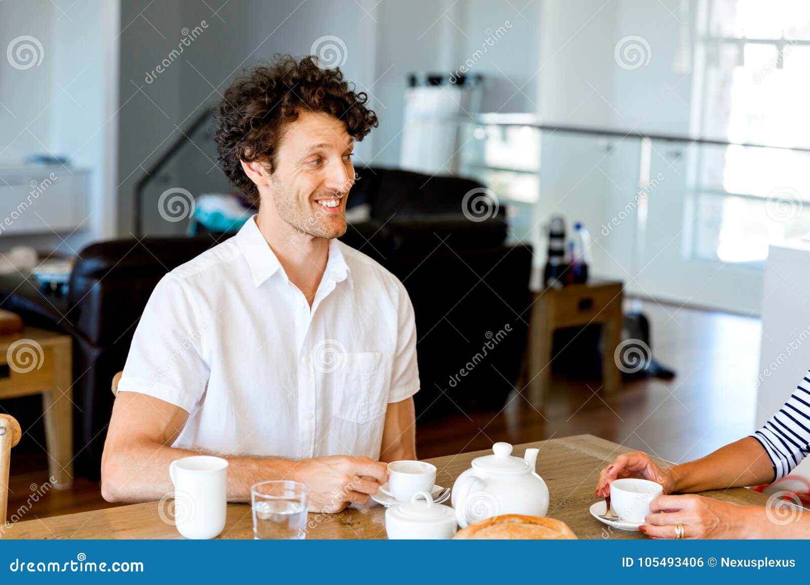 Man having tea at home stock photo. Image of caucasian - 105493406