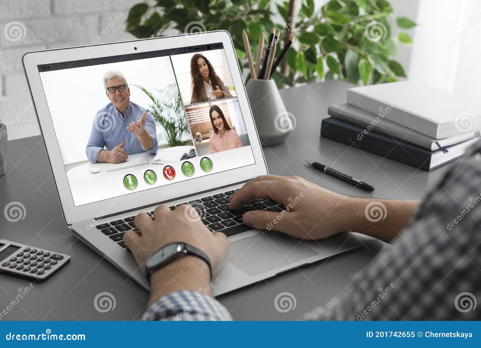 Man Having Video Chat with Colleagues at Table in Office, Closeup. Team ...