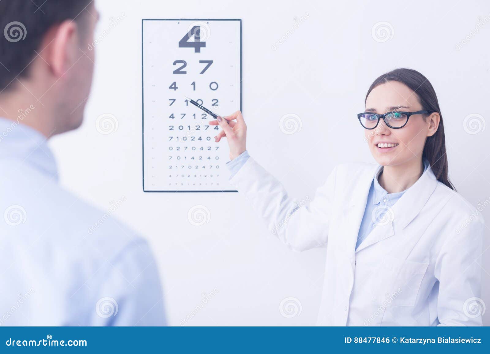 Man having vision test stock photo. Image of customer - 88477846