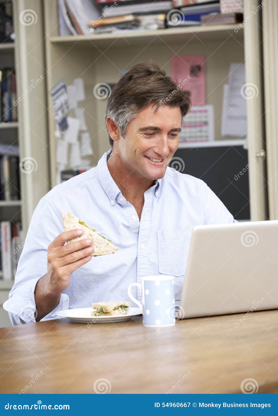 Man Having Working Lunch in Home Office Stock Image - Image of internet ...