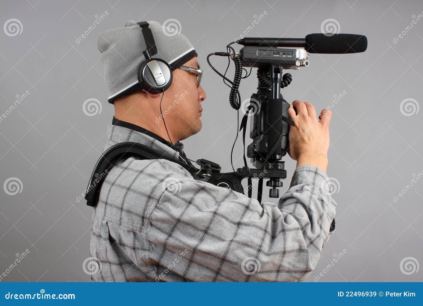 Man with HD SLR Camera and Audio Equipment Stock Image - Image of brace ...