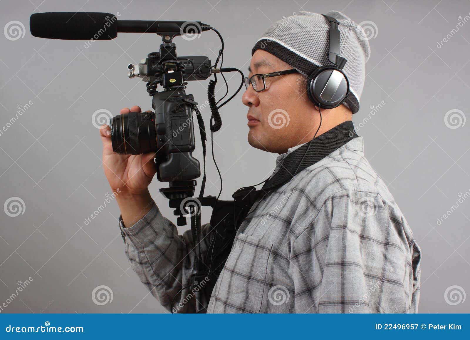 Man with HD SLR Camera and Audio Equipment Stock Image - Image of video ...
