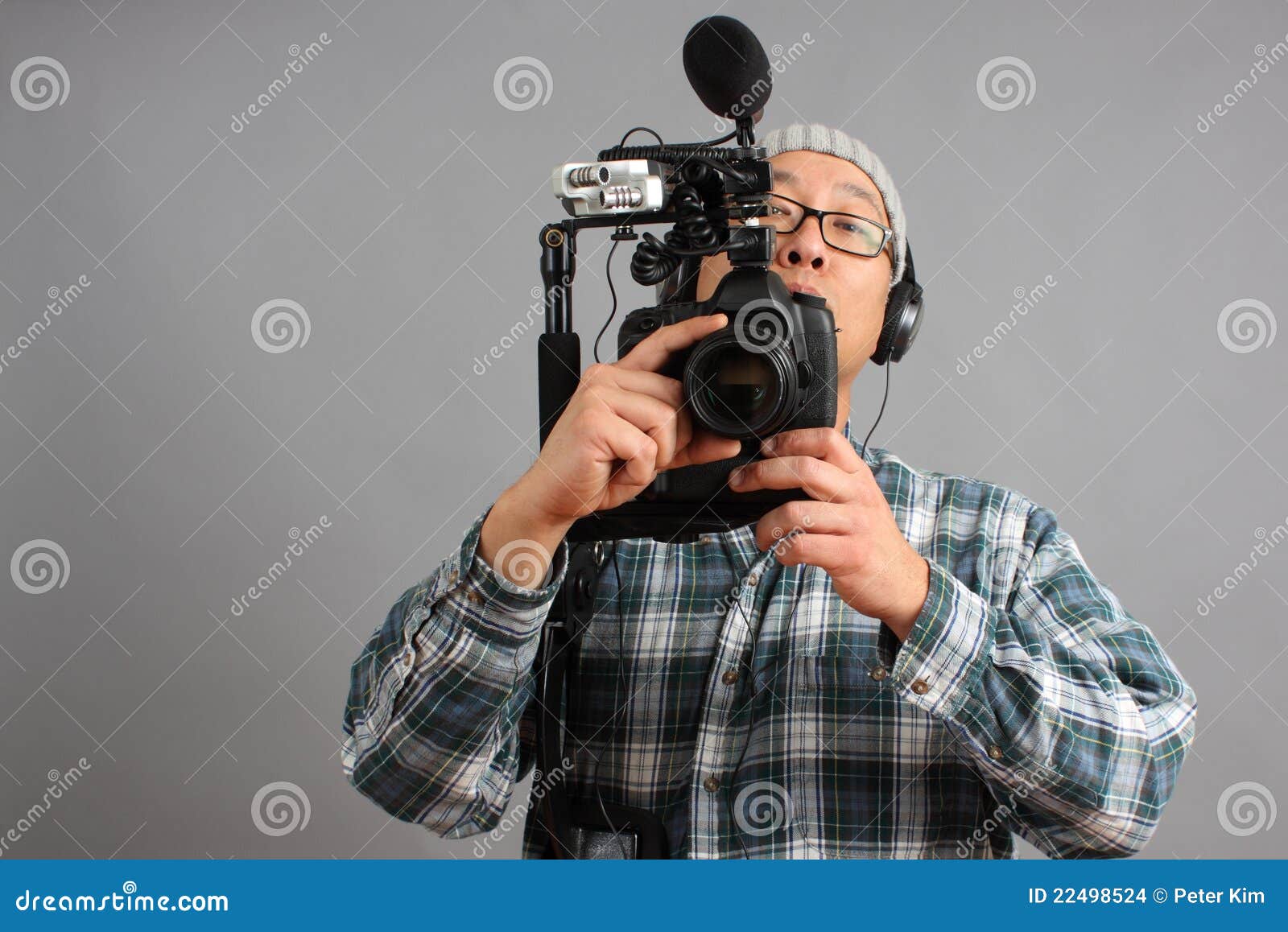 Man with HD SLR Camera and Audio Equipment Stock Photo - Image of lens ...