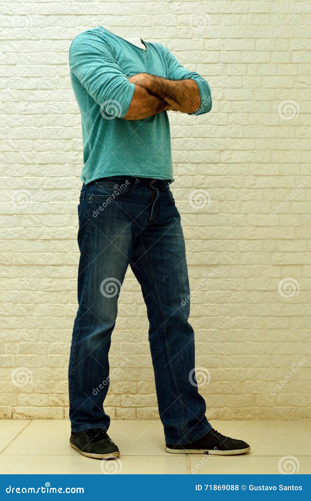 Man without Head in Front of a White Wall Stock Photo - Image of shirt ...