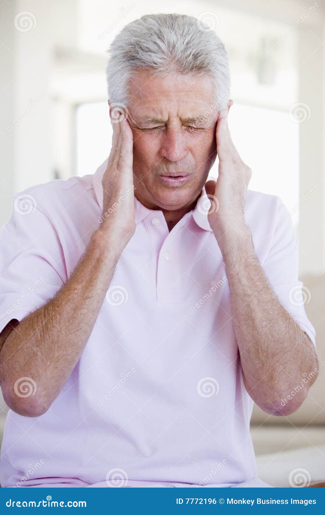 Man with a Headache stock photo. Image of painful, indoors - 7772196