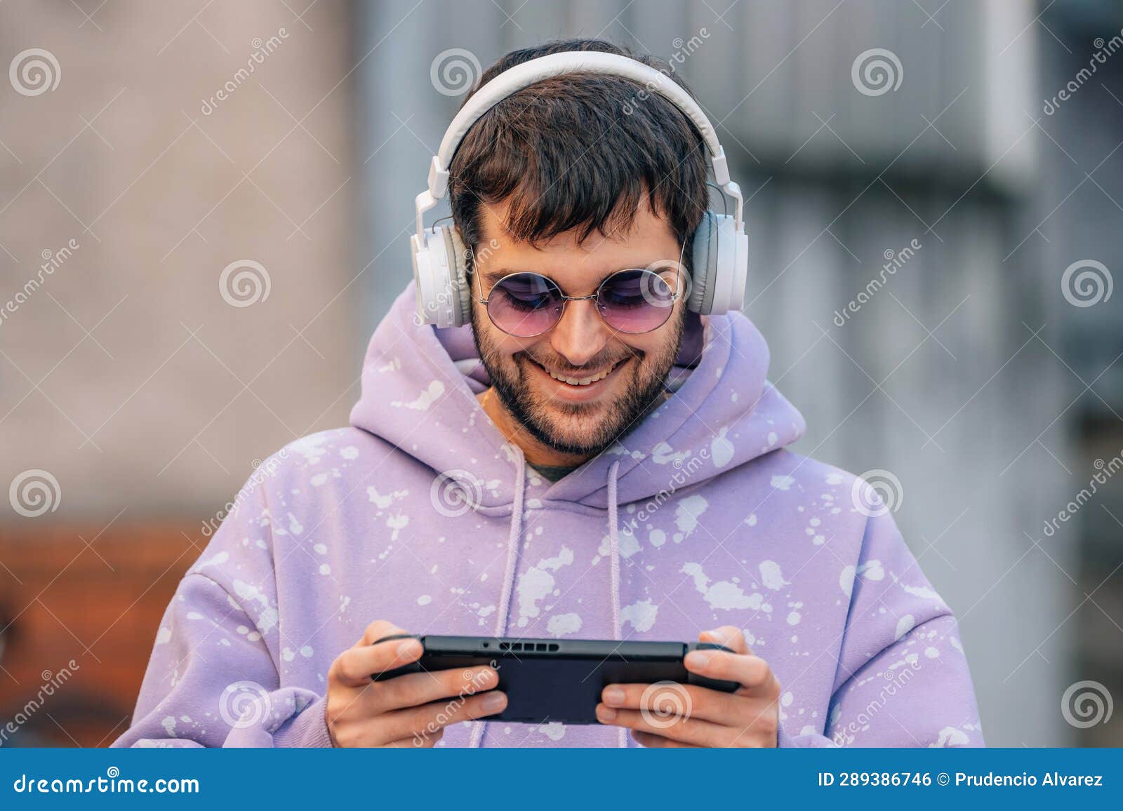 Man with Headphones and Console Playing Online, Gaming Stock Photo ...