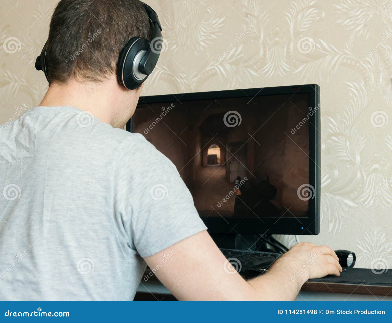 Man playing computer game. stock photo. Image of headset - 114281498