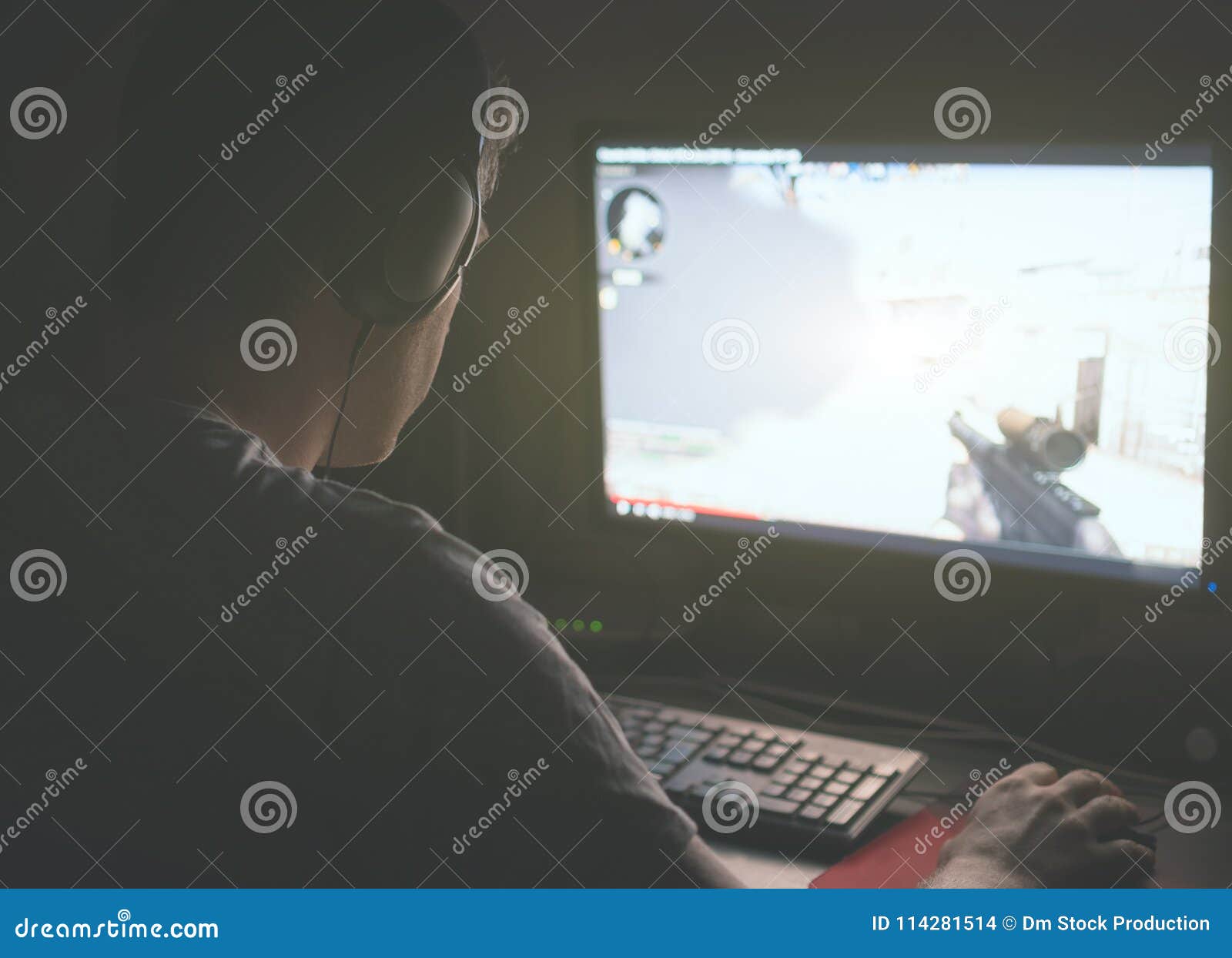 Man playing computer game. stock photo. Image of addiction - 114281514