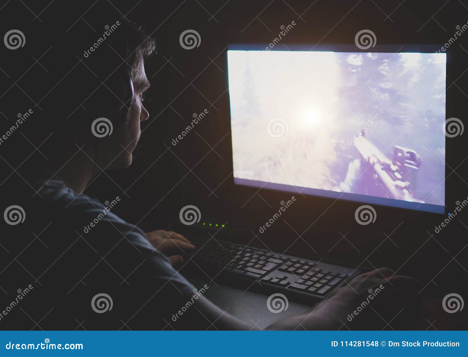 Man playing computer game. stock photo. Image of back - 114281548