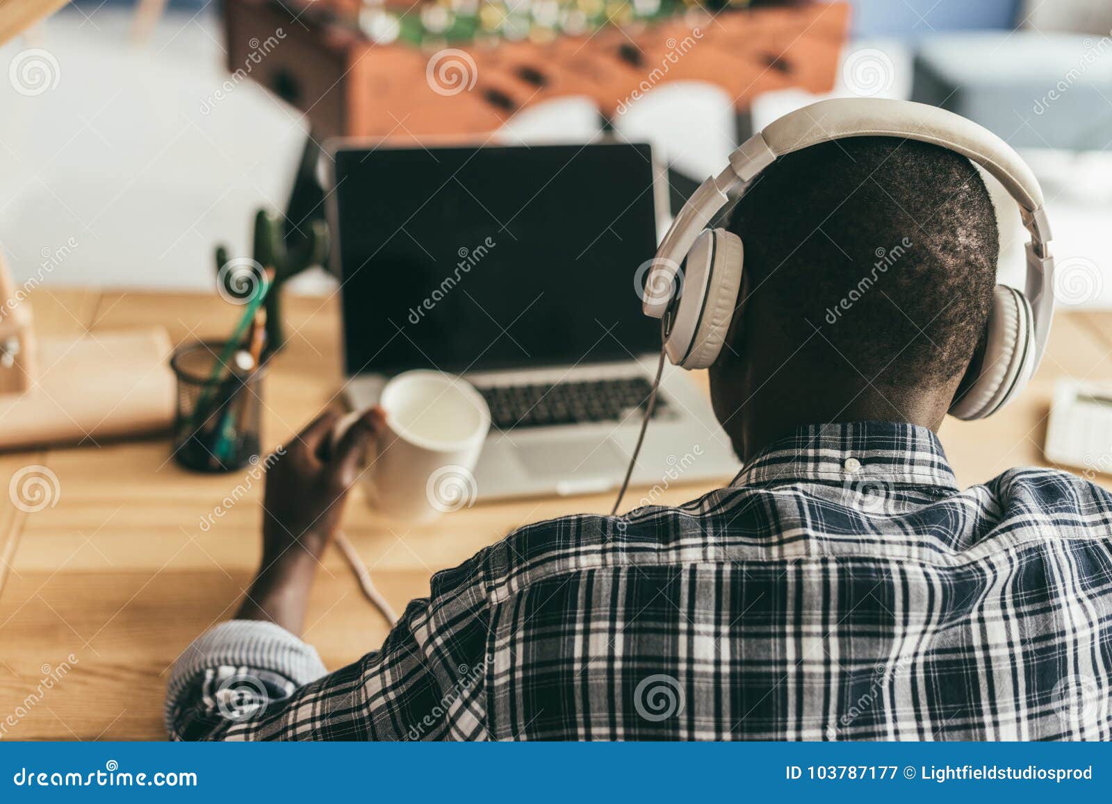 Man in Headphones Using Laptop Stock Image - Image of listening ...