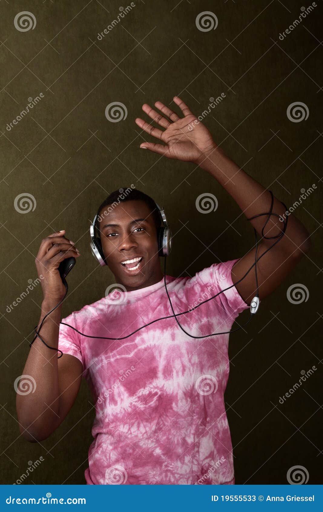 Man with Headphones Waves His Hand Stock Image - Image of hold, wave ...