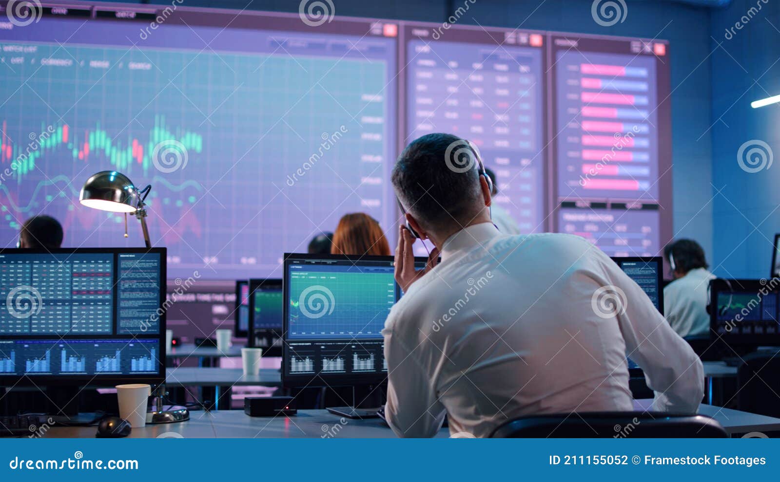 Male Trader Using Computer To Trade Stocks Stock Photo - Image of ...