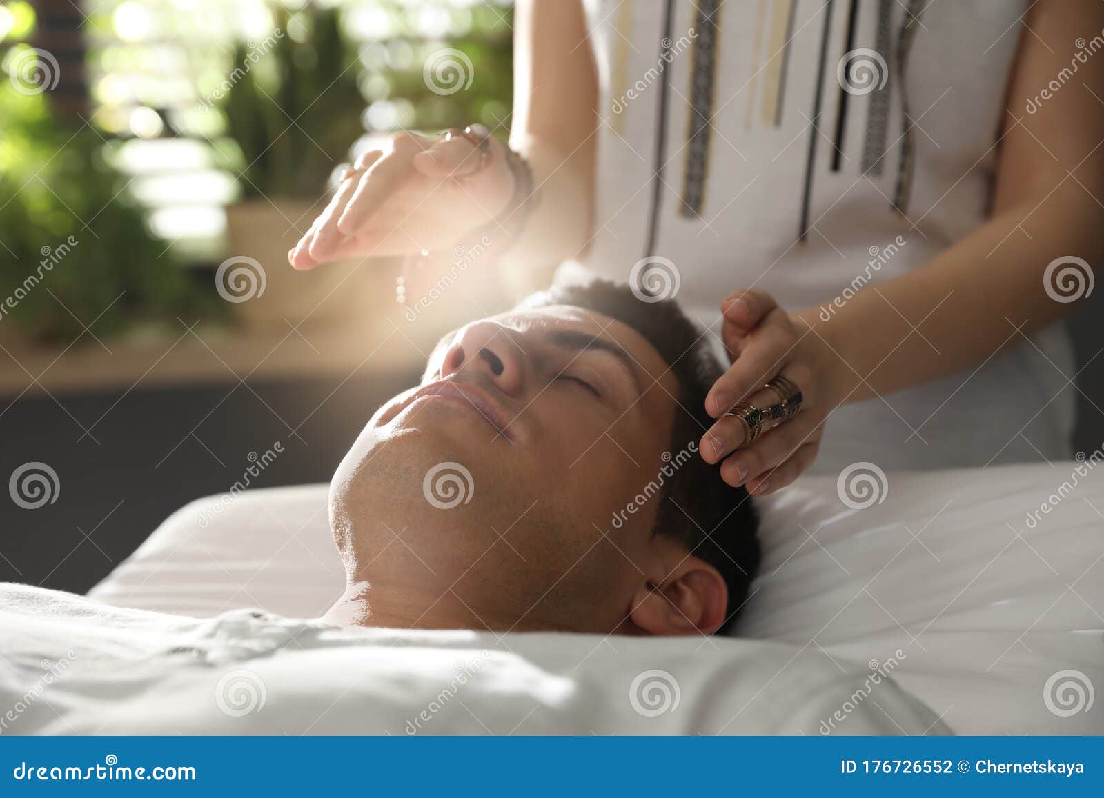 Man during Healing Session in Room Stock Photo - Image of reiki, heart ...