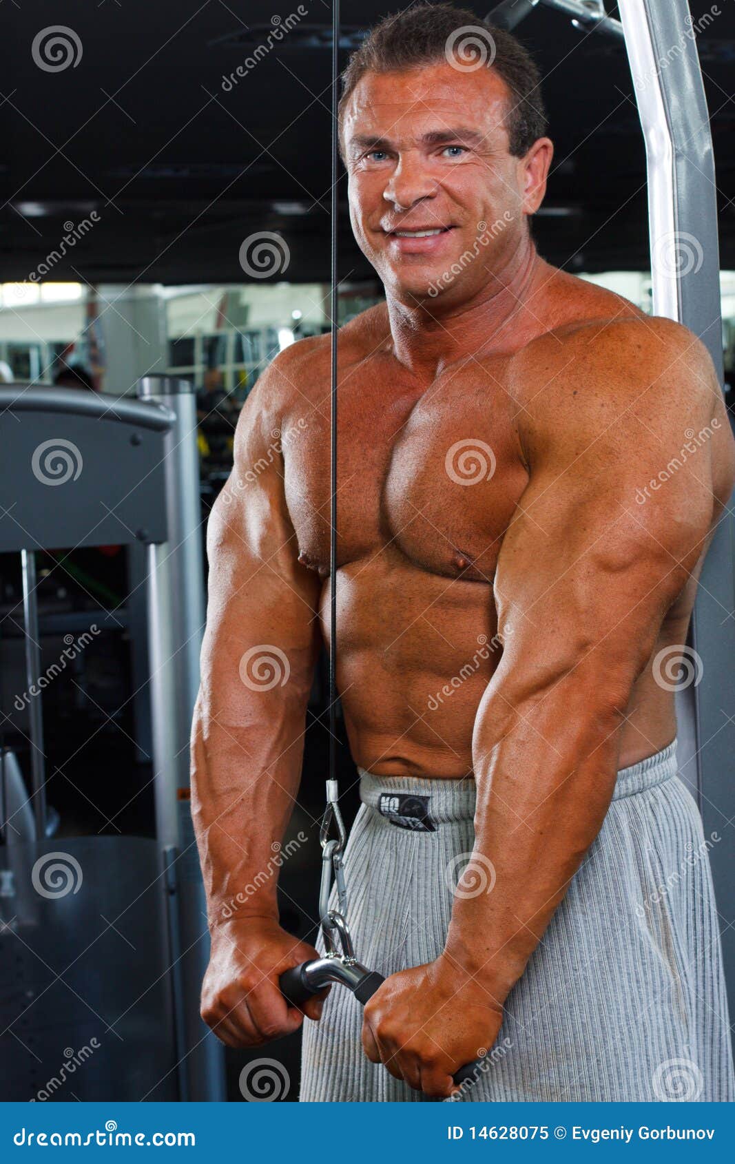 Man in a health club stock image. Image of action, body - 14628075