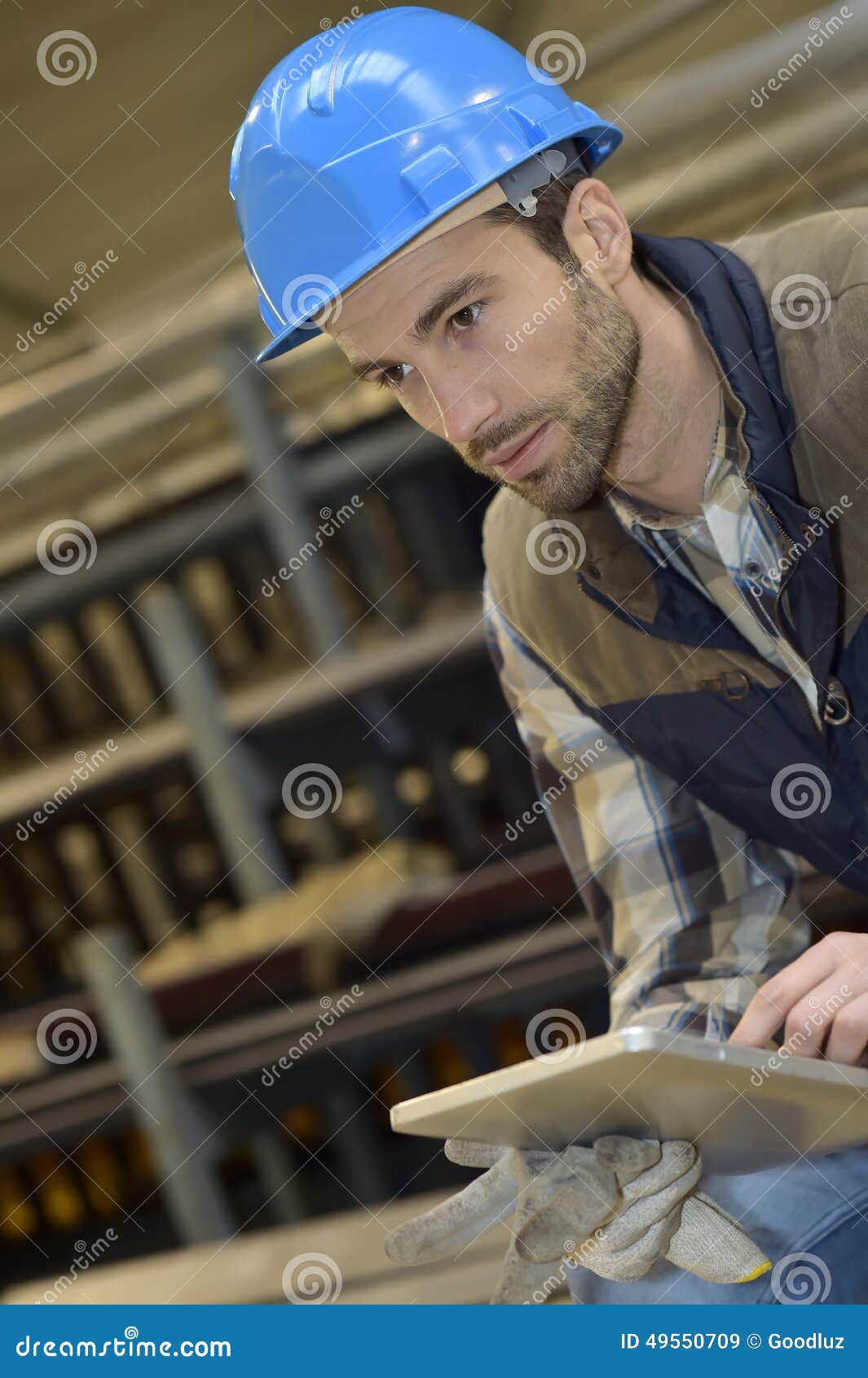 Man with Helmet in Manufacture Using Digital Tablet Stock Image - Image ...