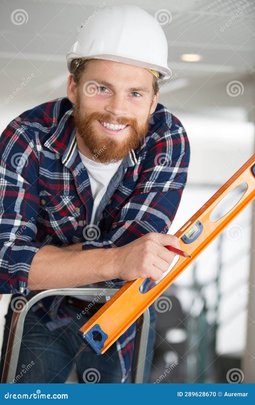 Man in Helmet Measuring Doorway with Level Stock Photo - Image of tool ...
