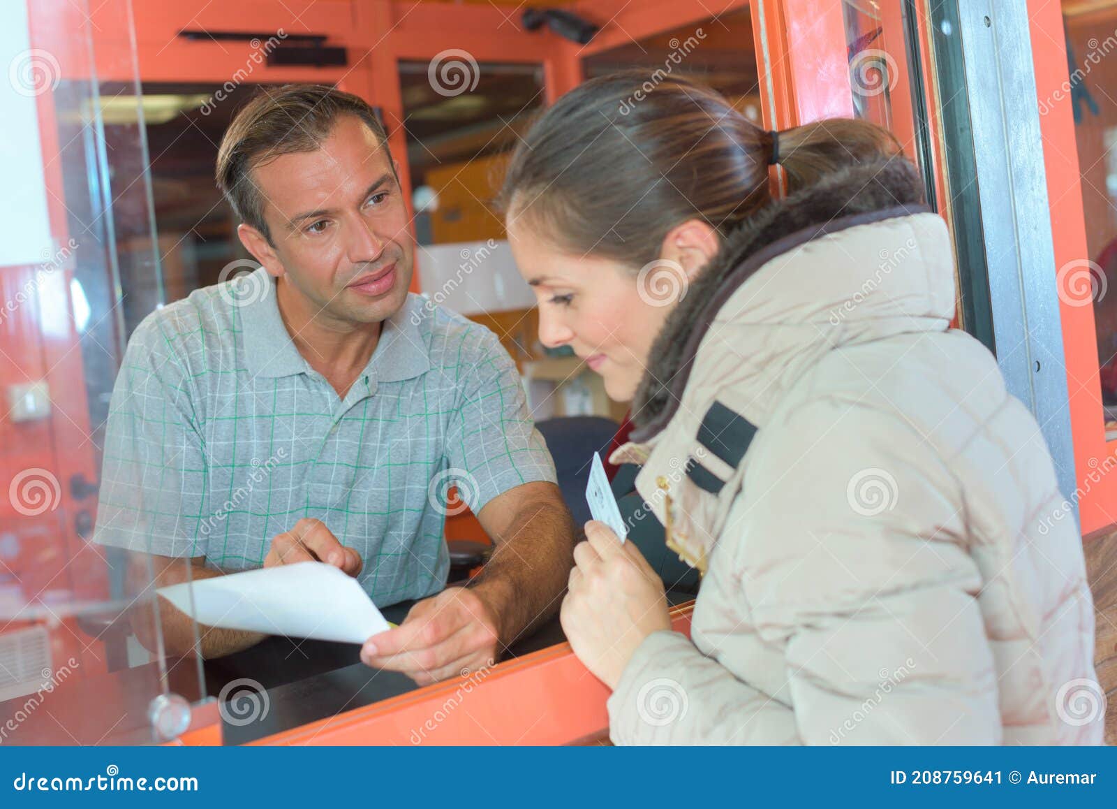Man helping customer stock image. Image of worker, smiling - 208759641