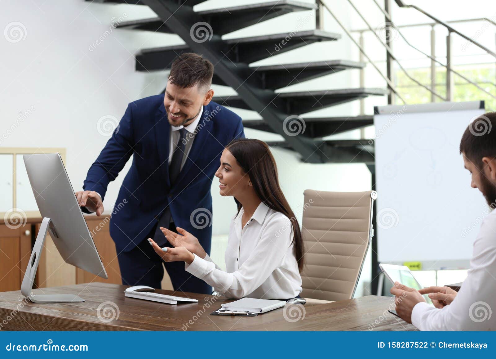 Man Helping His Colleague with Work Stock Photo - Image of cooperation ...